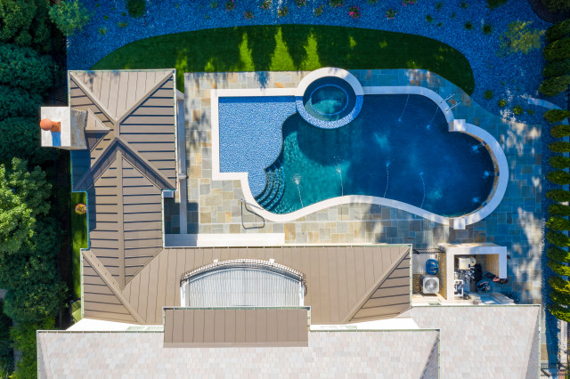 Naperville, IL freeform swimming pool with hot tub, large sunshelf ...
