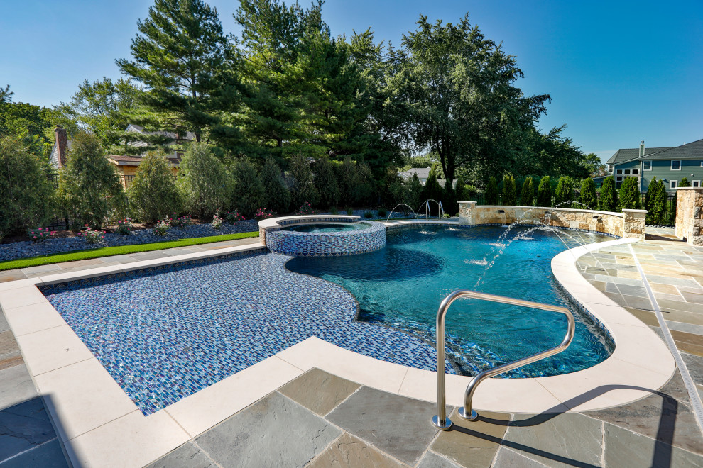 Naperville, IL freeform swimming pool with hot tub, large sunshelf ...