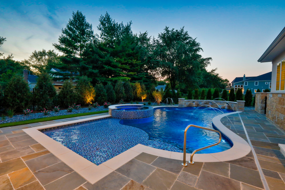 Naperville, IL freeform swimming pool with hot tub, large sunshelf ...