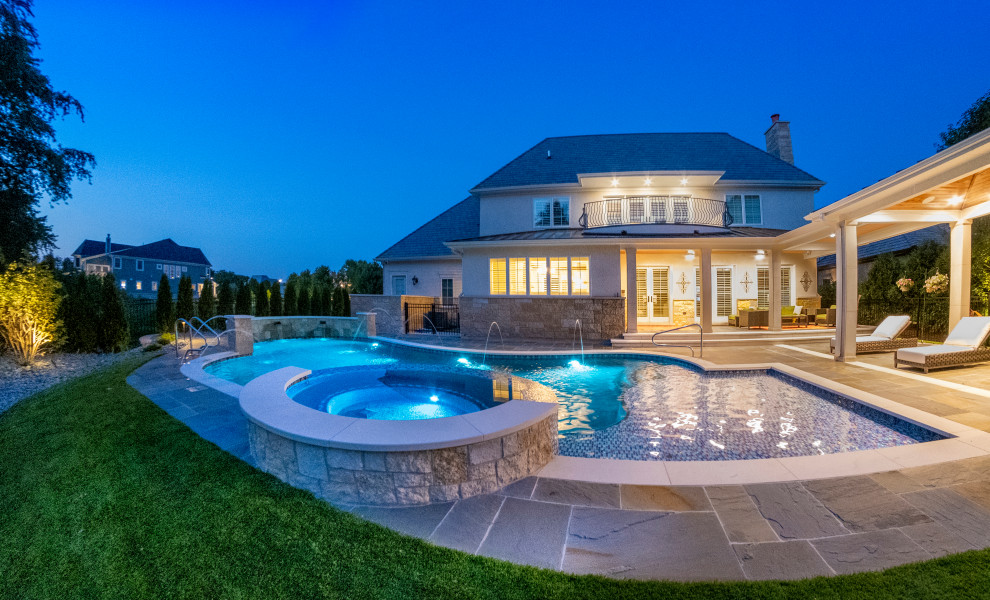 Naperville, IL freeform swimming pool with hot tub, large sunshelf ...