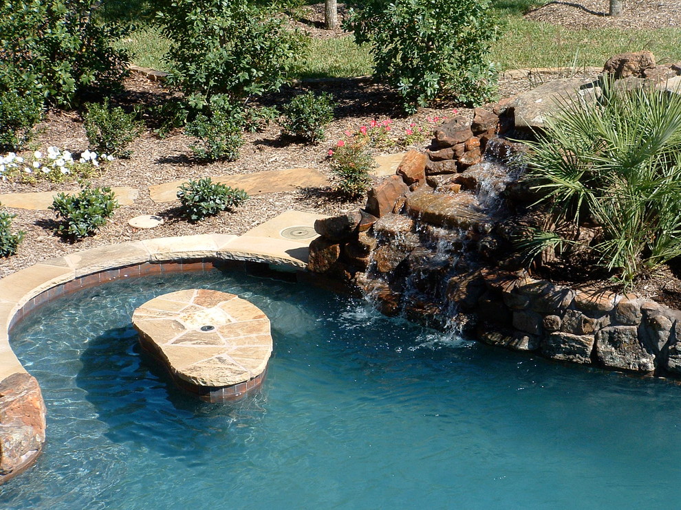 Natural Beach Entry Freeform Pool with slide, table and cascading ...