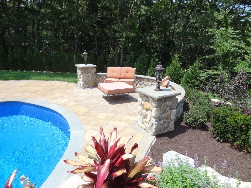 New York Tropical Outdoor Entertaining Space with Natural Stone ...