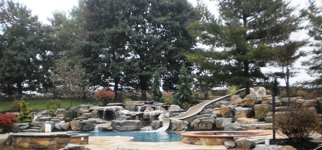 North Whitehall custom pool with spa, flume, sunshelf, and boulder ...