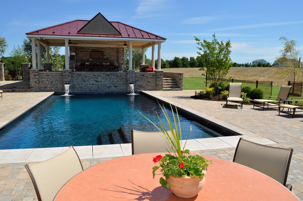 Open air pool pavilion looking out over pool and pool deck ...