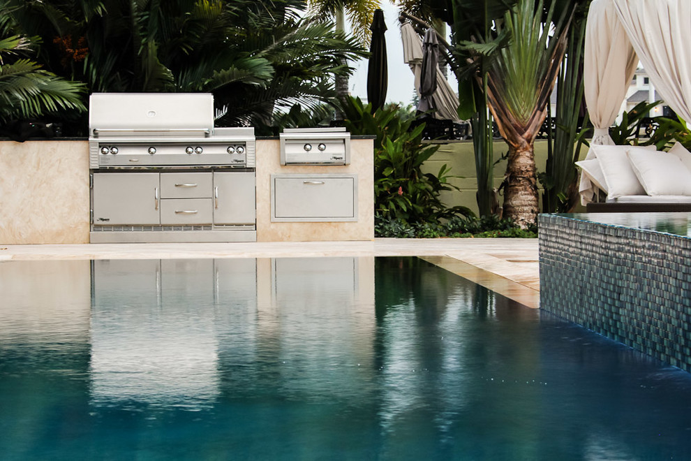 Outdoor Kitchen for Wet Edge Pool with Custom Tiled Spa and Laminar ...