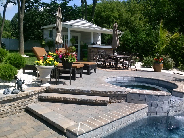 Paver Walkways and Pool Deck with Stone Veneer Retaining Wall ...