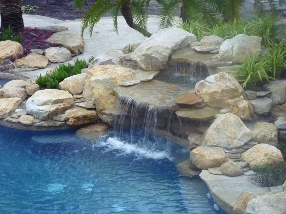 Pool waterfall in Miami - Tropical - Pool - Miami - by Matthew ...