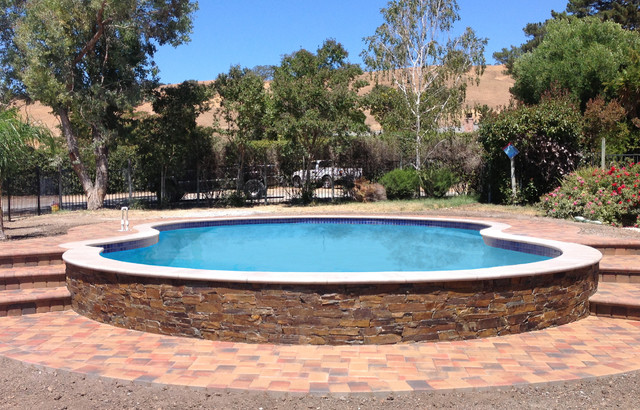 Pool with Copper Loose Stone Veneer and Pavers - Traditional - Pool ...