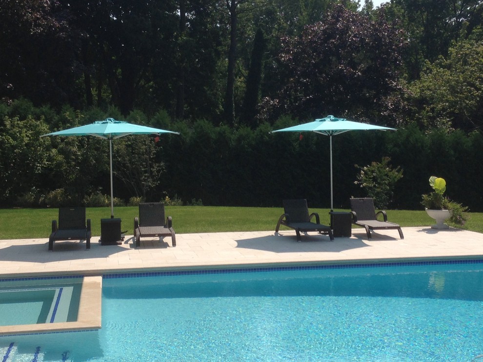 Poolside Wicker Lounge Chairs and Market Umbrella - Contemporary - Pool ...