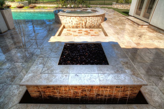 Rectangular pool with walkover water feature, fire pit, and landscape ...