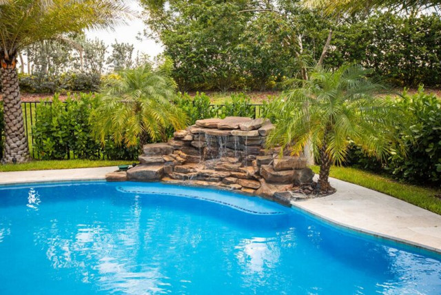 Rock Waterfall Freeform Custom Pool and Spa in Parkland, Florida - Pool ...