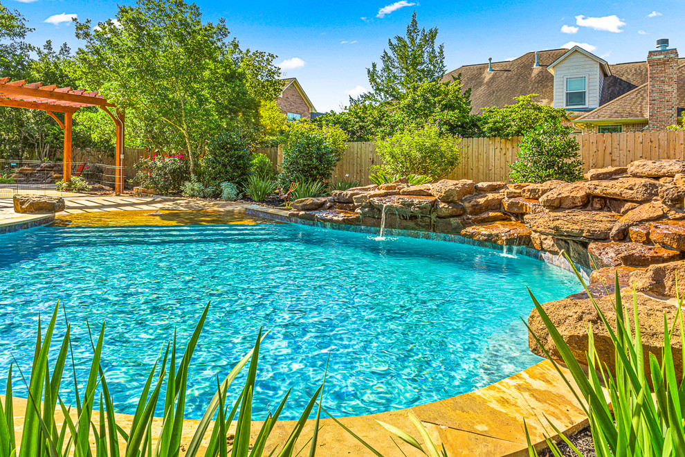 Rock Waterfall with Flagstone Coping, Pergola, Beach Entry and Bubbler ...