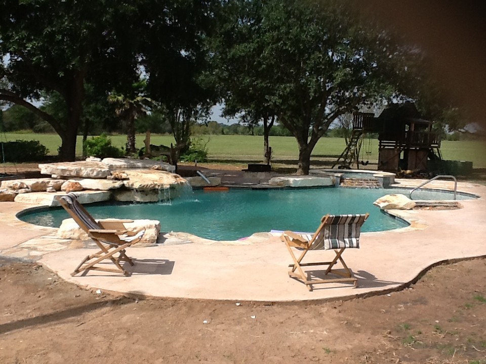 Rustic country side pool by Cali Pools of Texas - Rustic - Pool ...