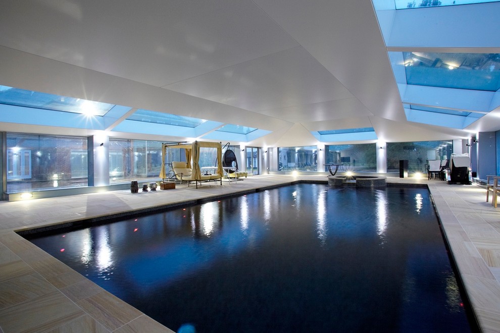 Spa and swimming pool with unique lighting - Modern - Pool - New York ...