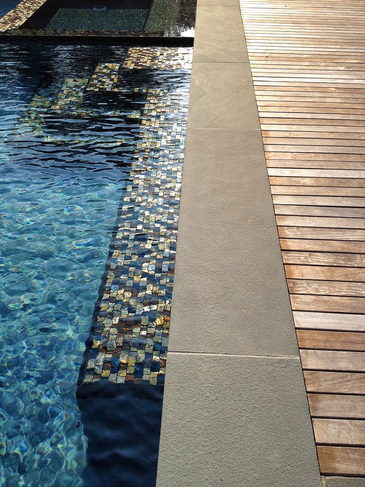 SPA: glass tile spa with adjacent shallow end steps + sun bench ...