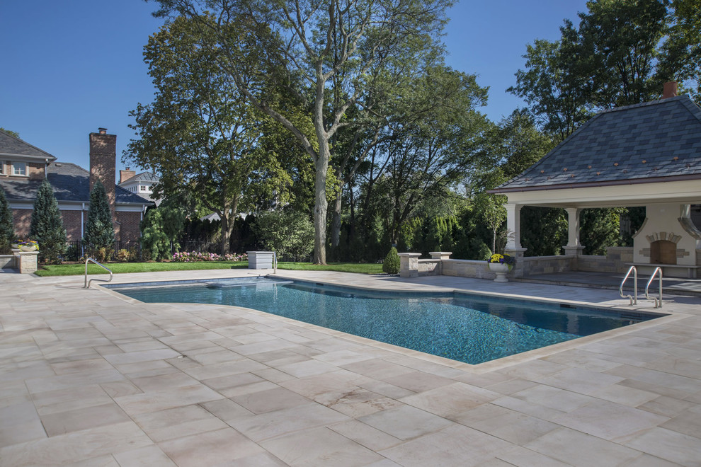 Stone Pool Deck with Pool and Spa - Pool - Chicago - by Platinum ...