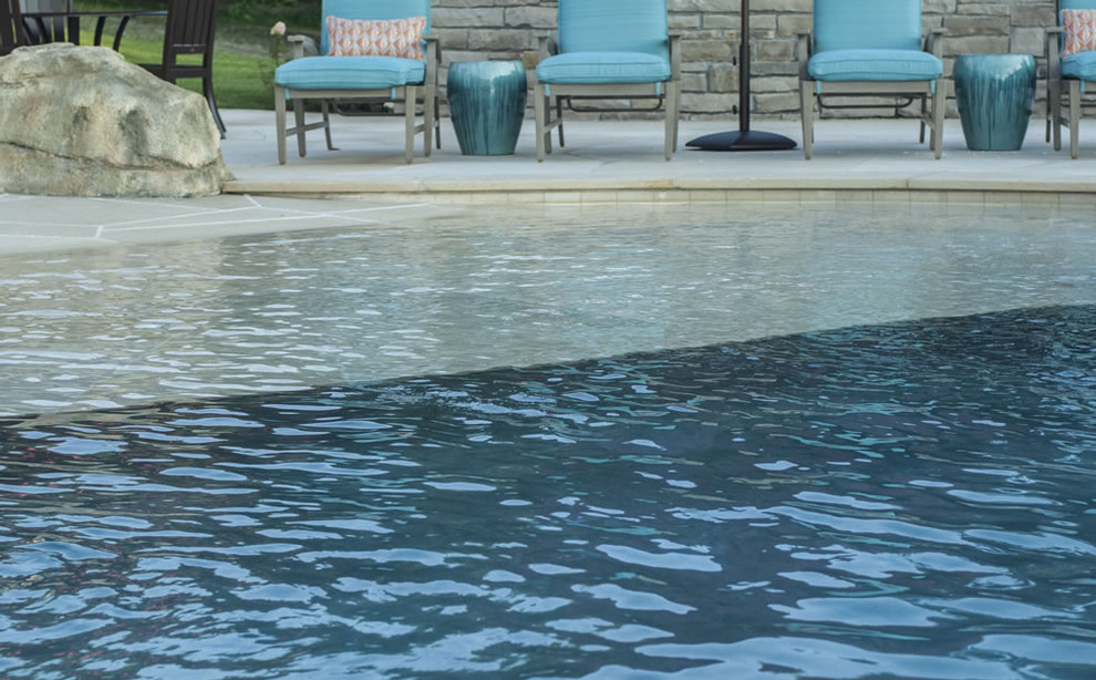 Stone Sunshelf in Pool - Pool - Chicago - by Platinum Poolcare | Houzz