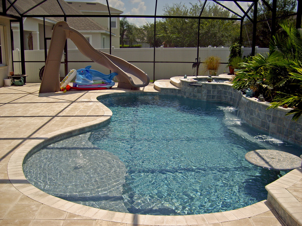 Table in Pool - Tropical - Pool - Orlando - by American Pools & Spas ...