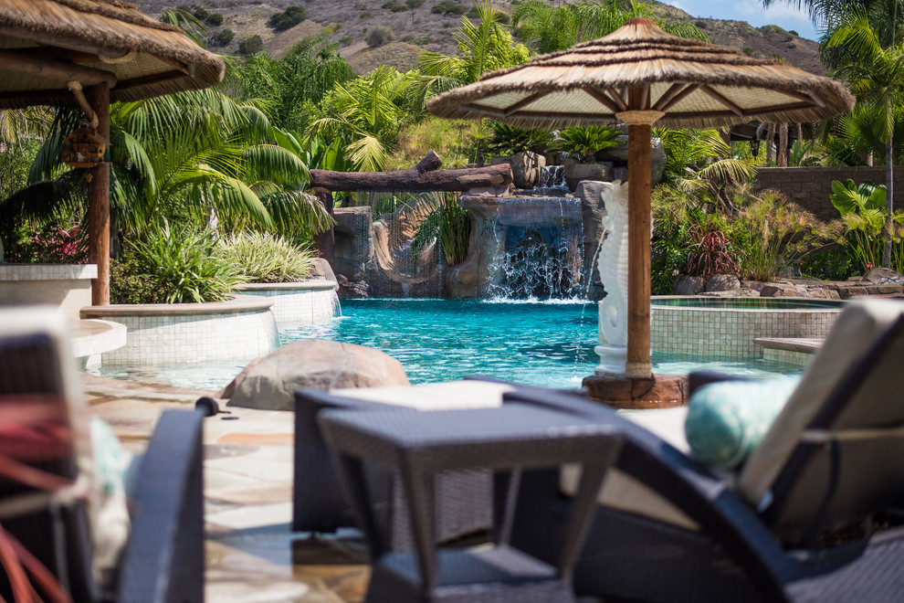 Tropical Beach Entry Pool & Spa with a Rock Slide & Grotto - Tropical ...