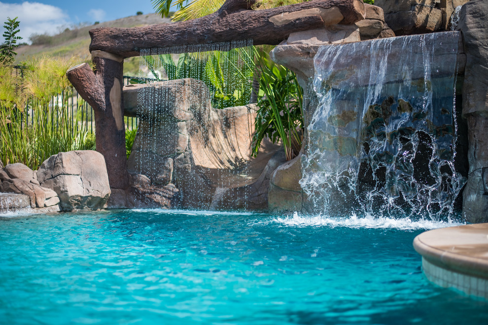 Tropical Beach Entry Pool & Spa with a Rock Slide & Grotto - Tropical ...