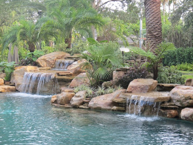 Tropical gardens and pool waterfalls in Miami - Tropical - Pool - Miami ...