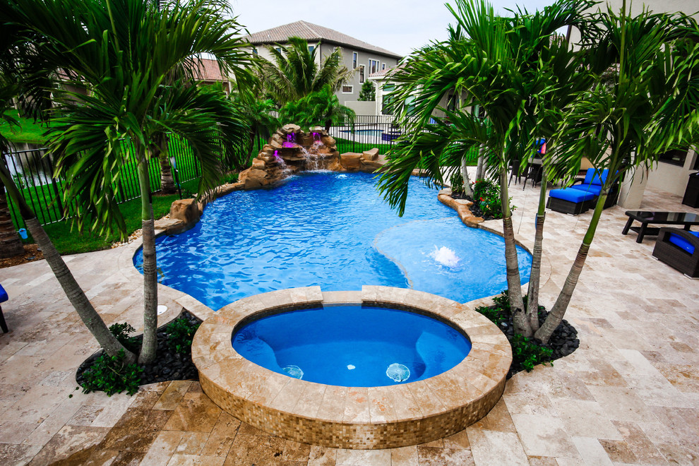Tropical Style Pool With Rock Waterfall and Raised Spa in Delray Beach ...
