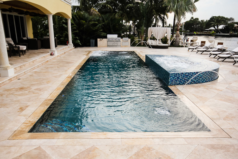 Wet Edge Pool with Custom Tiled Spa and Laminar Deck Jets in Fort ...