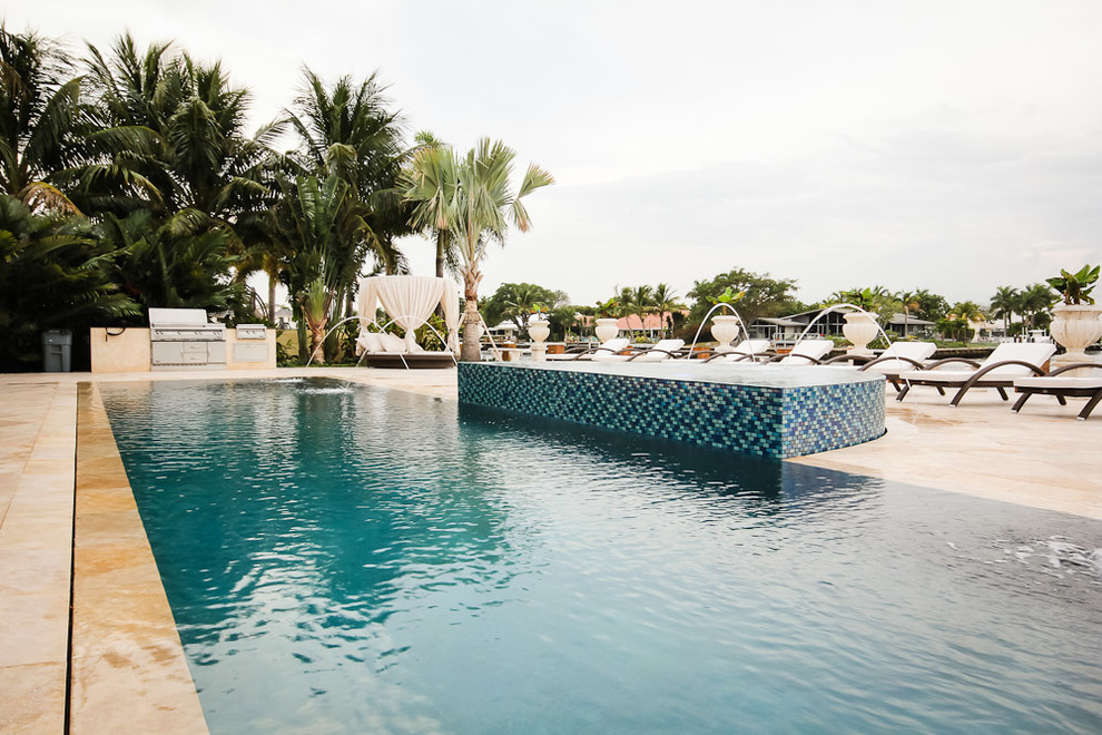 Wet Edge Pool with Custom Tiled Spa and Laminar Deck Jets in Fort ...