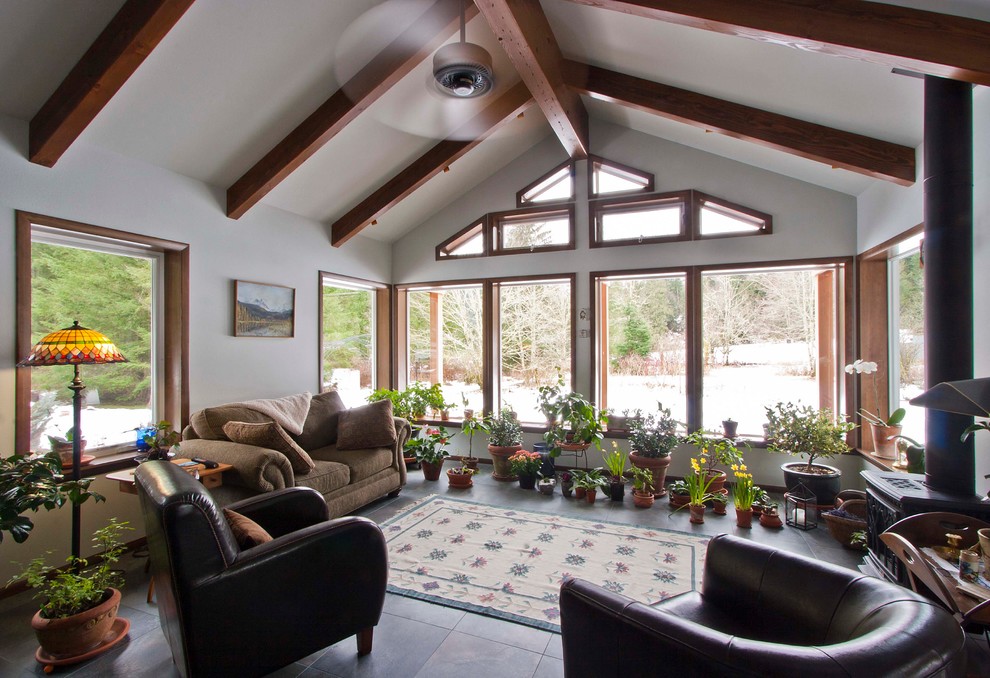 Expansive sunroom addition that added much needed natural light to this ...