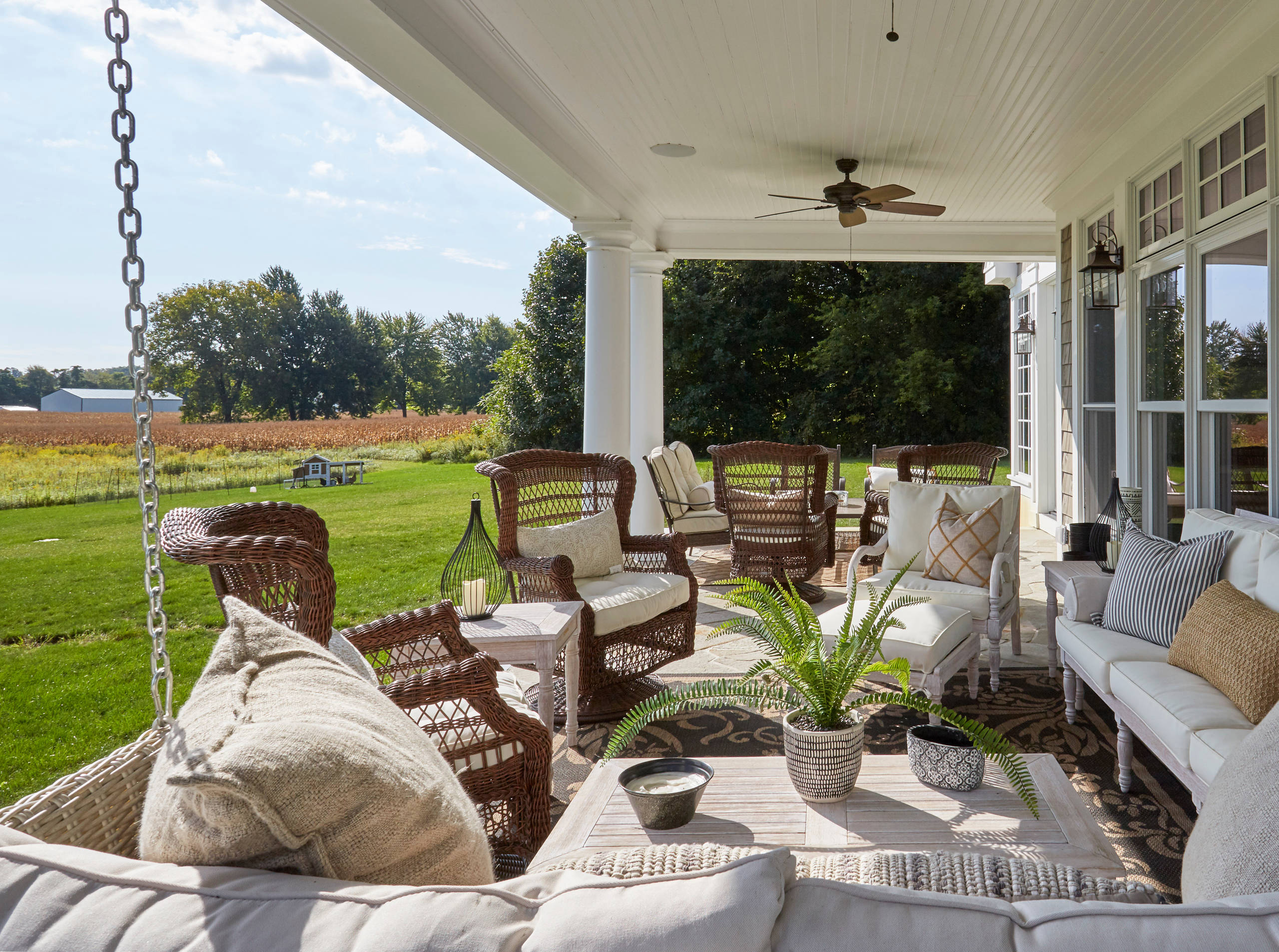 rear-porch-with-porch-swing-and-plenty-of-seating-orren-pickell ...