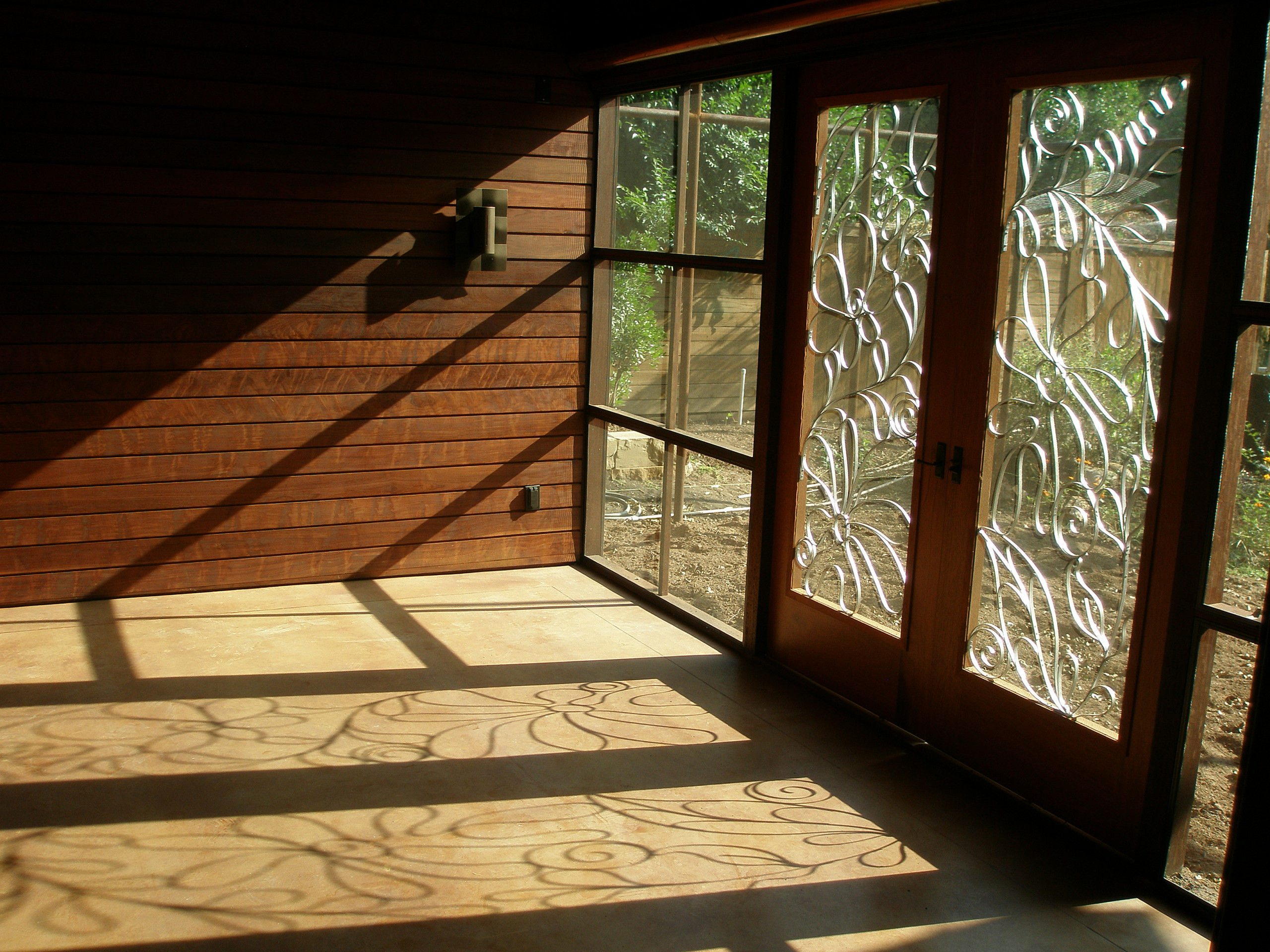 Sculptor Susan Wallace Turns Screen Doors Into Art