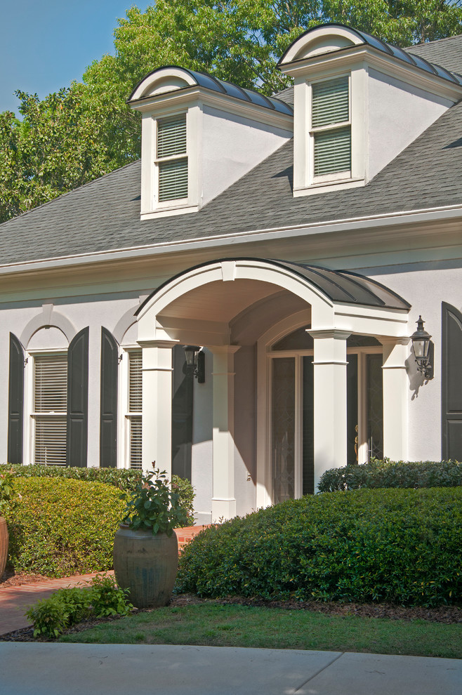 Two column arched portico with gable roof located in Marietta, GA ...