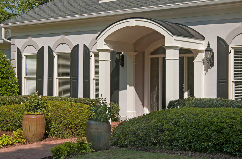 Two column arched portico with gable roof located in Marietta, GA ...