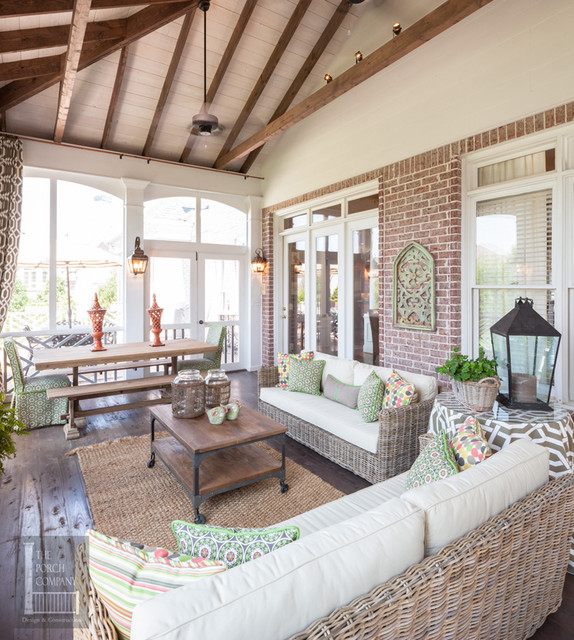 Two story double porch with outdoor fireplace, travertine patio, and ...