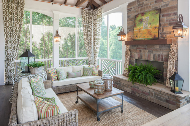 Two story double porch with outdoor fireplace, travertine patio, and ...