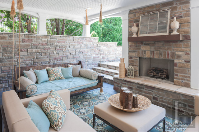 Two story double porch with outdoor fireplace, travertine patio, and ...