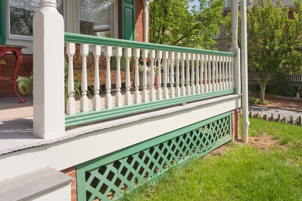 Victorian columns and balusters were secured and repainted ...