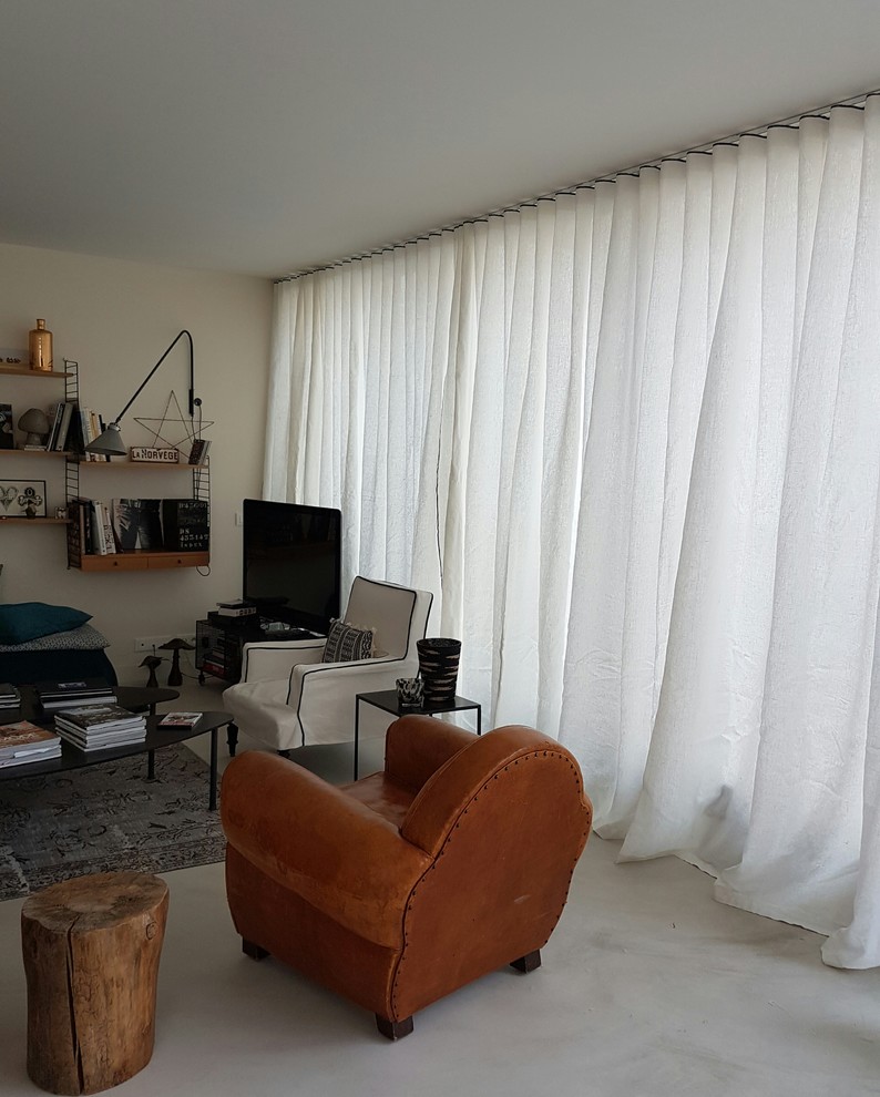 la confection de rideaux en lin lavé pour une maison contemporaine ...