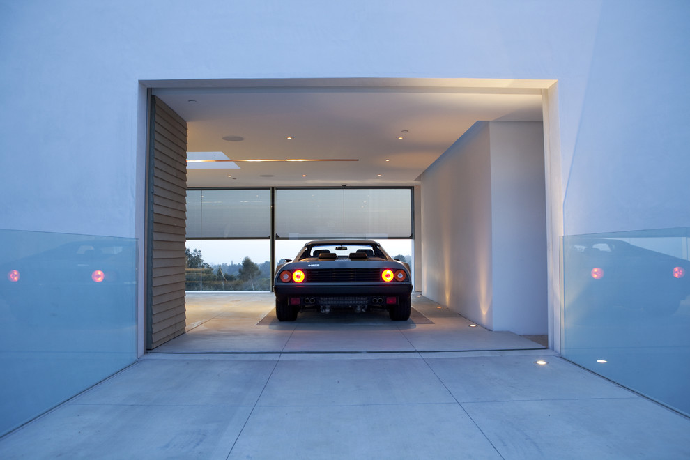 Retractable screens at The Ultimate Garage - Contemporary - Garage ...