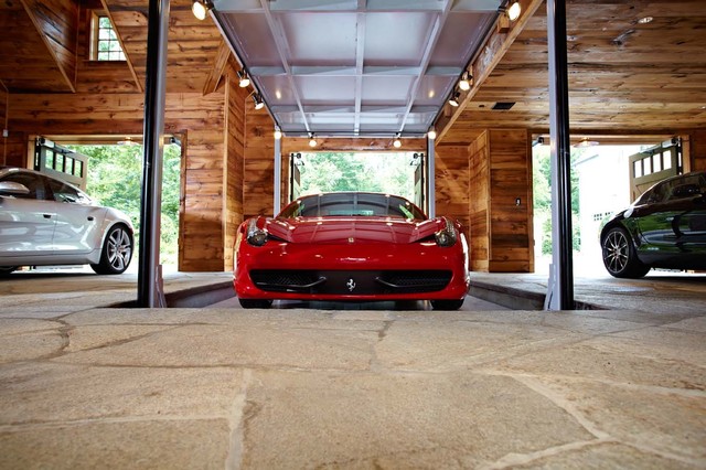 Ultimate man cave and sports car showcase - Traditional - Garage - New ...