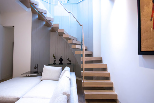 Challenging floating tread staircase fitted within limited space ...