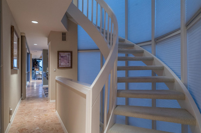 Circular stairwell adjoins the two wings. - Contemporary - Staircase ...