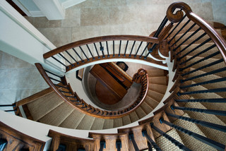 Curved Staircase in Turret Traversing Three Floors - Traditional ...