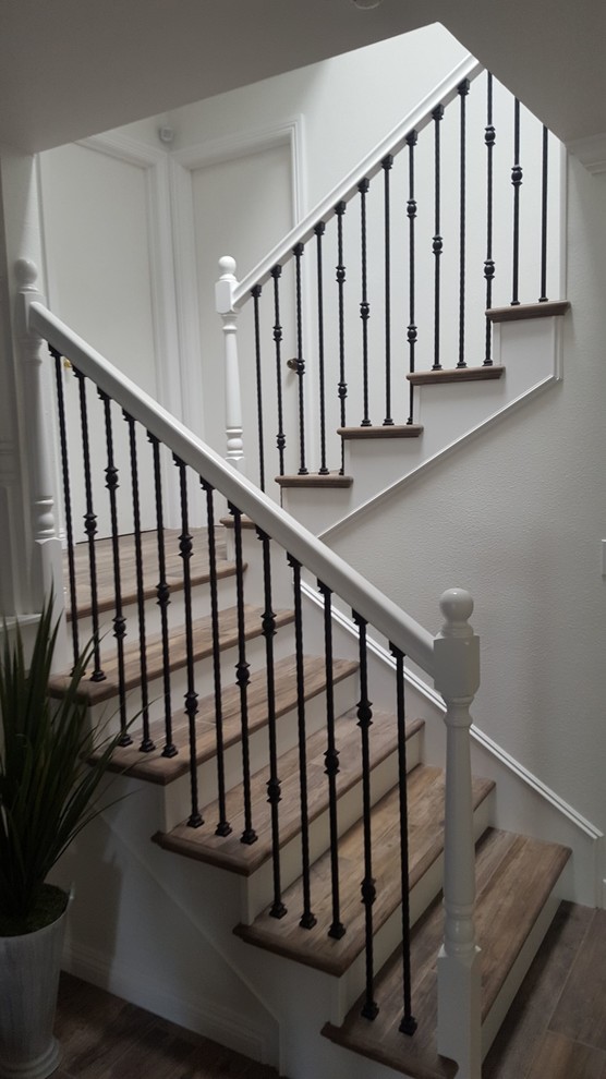 Custom stain and paint combo stairs. - Modern - Staircase - Orange ...