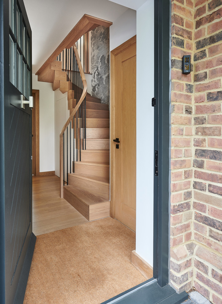 Double Kite winding staircase in oak with wrought iron spindles ...