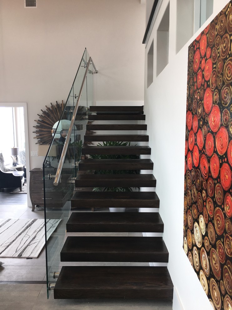 Floating iron stair with glass railings - Contemporary - Staircase ...