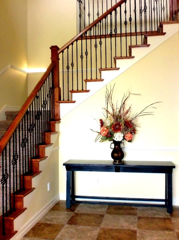 Grand wrought iron stair case with cherry rails - Mediterranean ...
