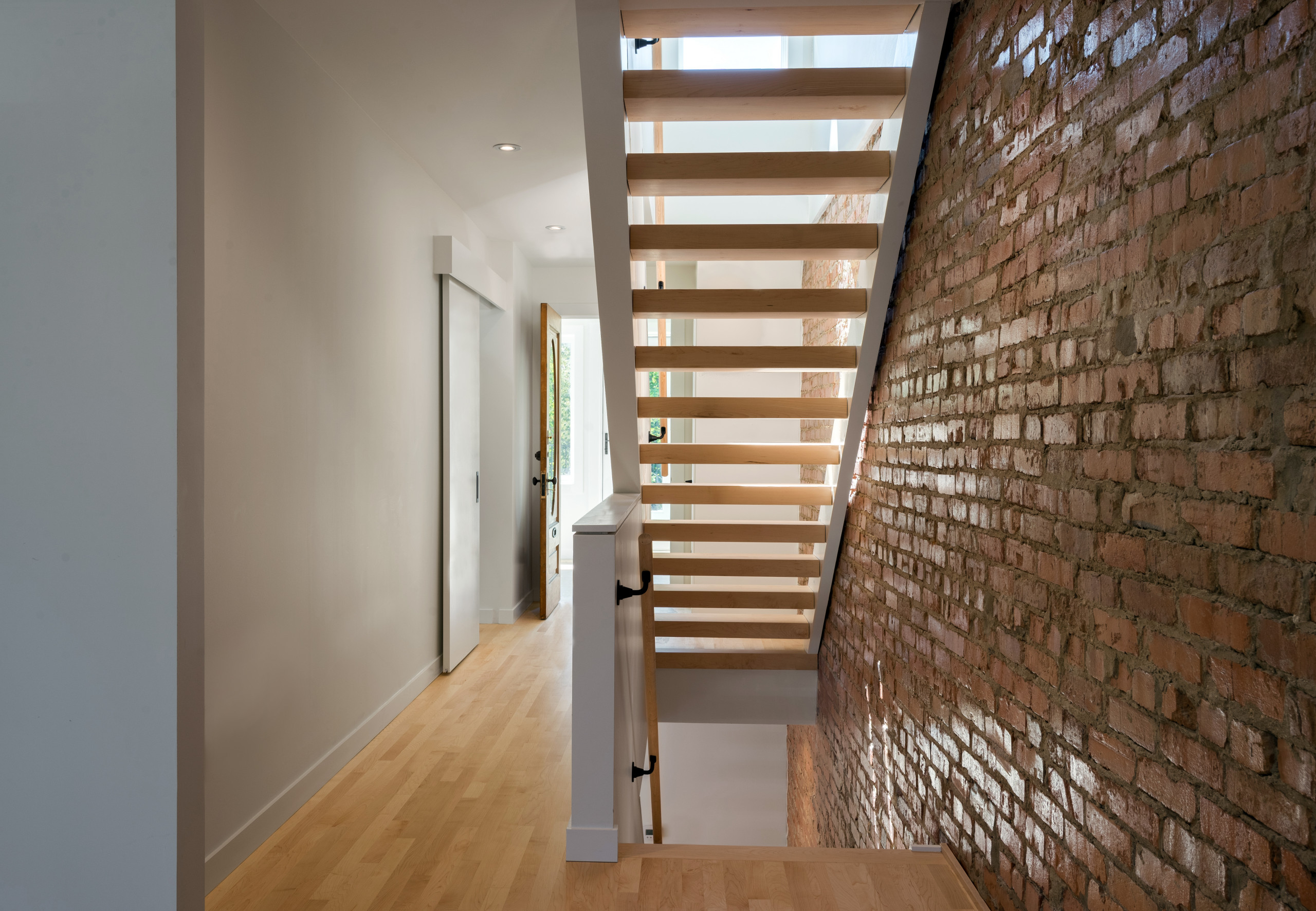 Wood Stair Risers With Brick Wall