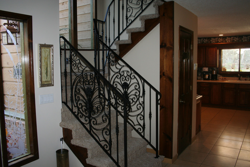 Interior custom ornamental iron stair rail with custom design panels ...