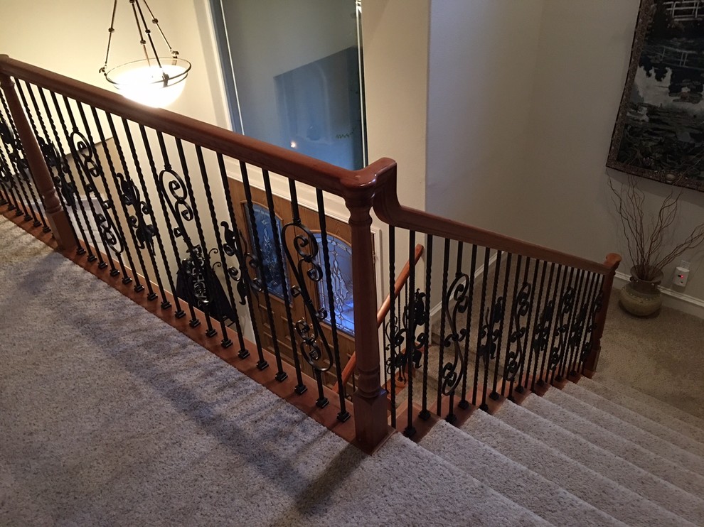Metal Baluster Stairs with alternating Scroll and Oak Leaf details ...